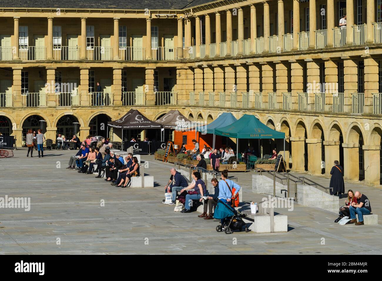 Historic Piece Hall courtyard attraction (sunny piazza, visitors ...
