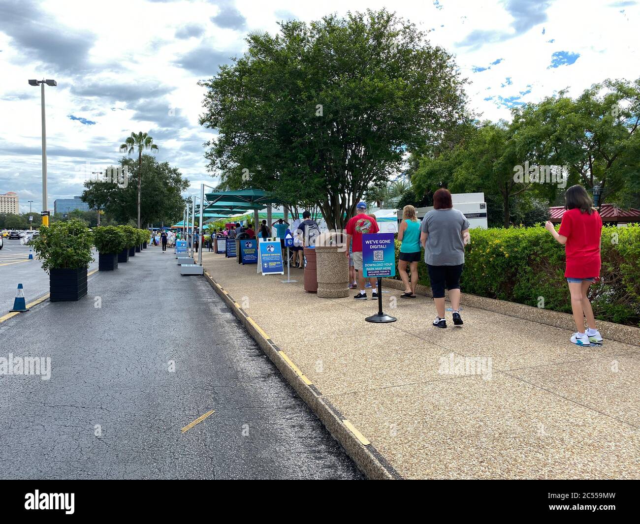 Orlando, FL/USA - 6/19/20: People waiting in line to get temperature ...