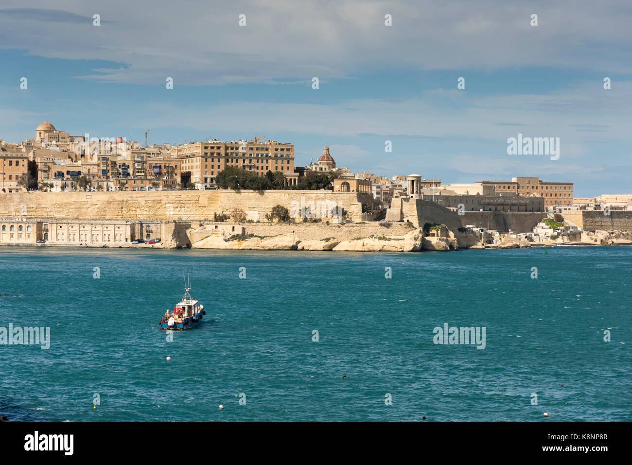 The Grand Harbour at Birgu Malta with a fishing boat moored and Stock ...