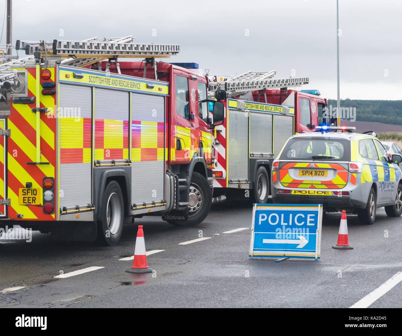 emergency services vehicles at a road traffic accident, Scotland, UK ...