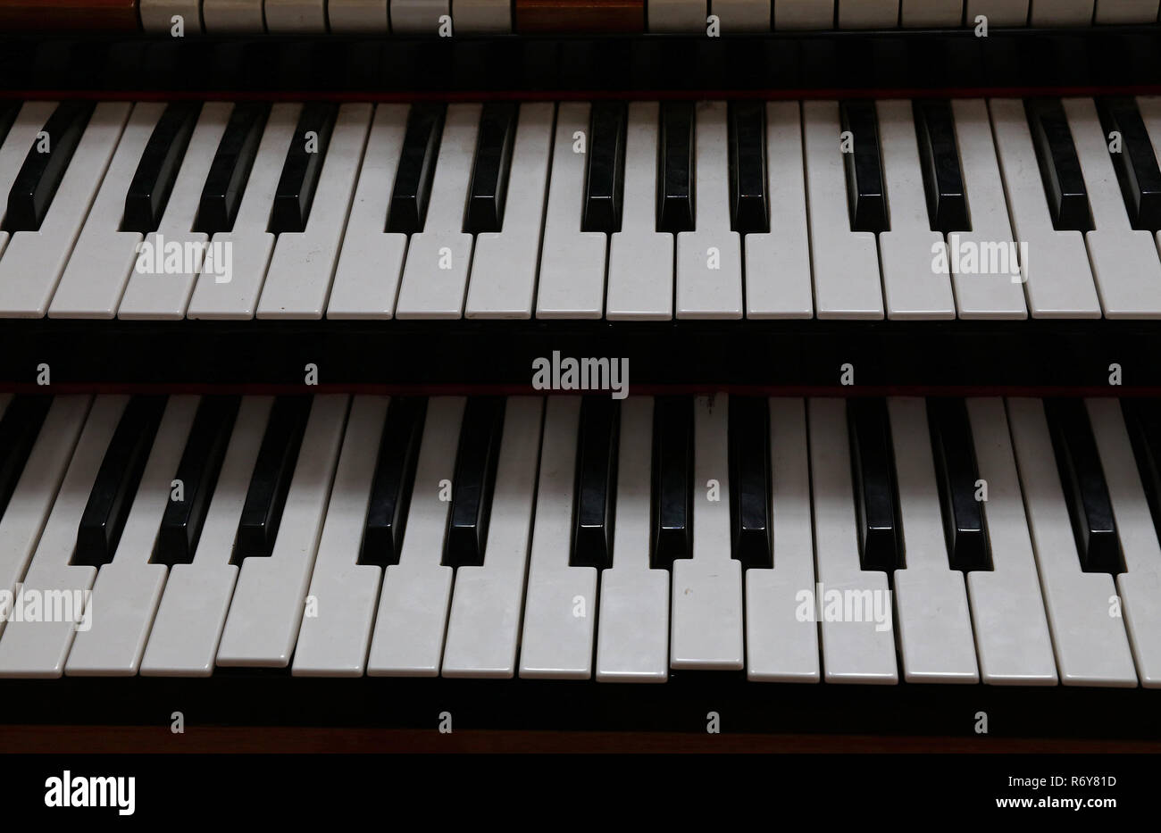 Close up old vintage double keyboard of organ Stock Photo - Alamy