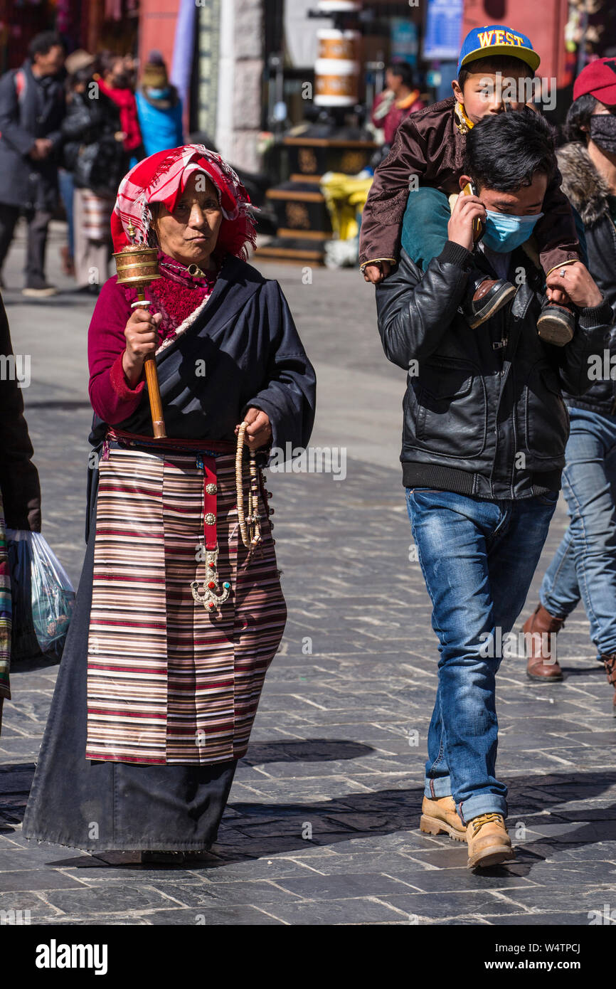 China, Tibet, Lhasa, Tibetan Buddhist pilgrims from the Kham region of ...